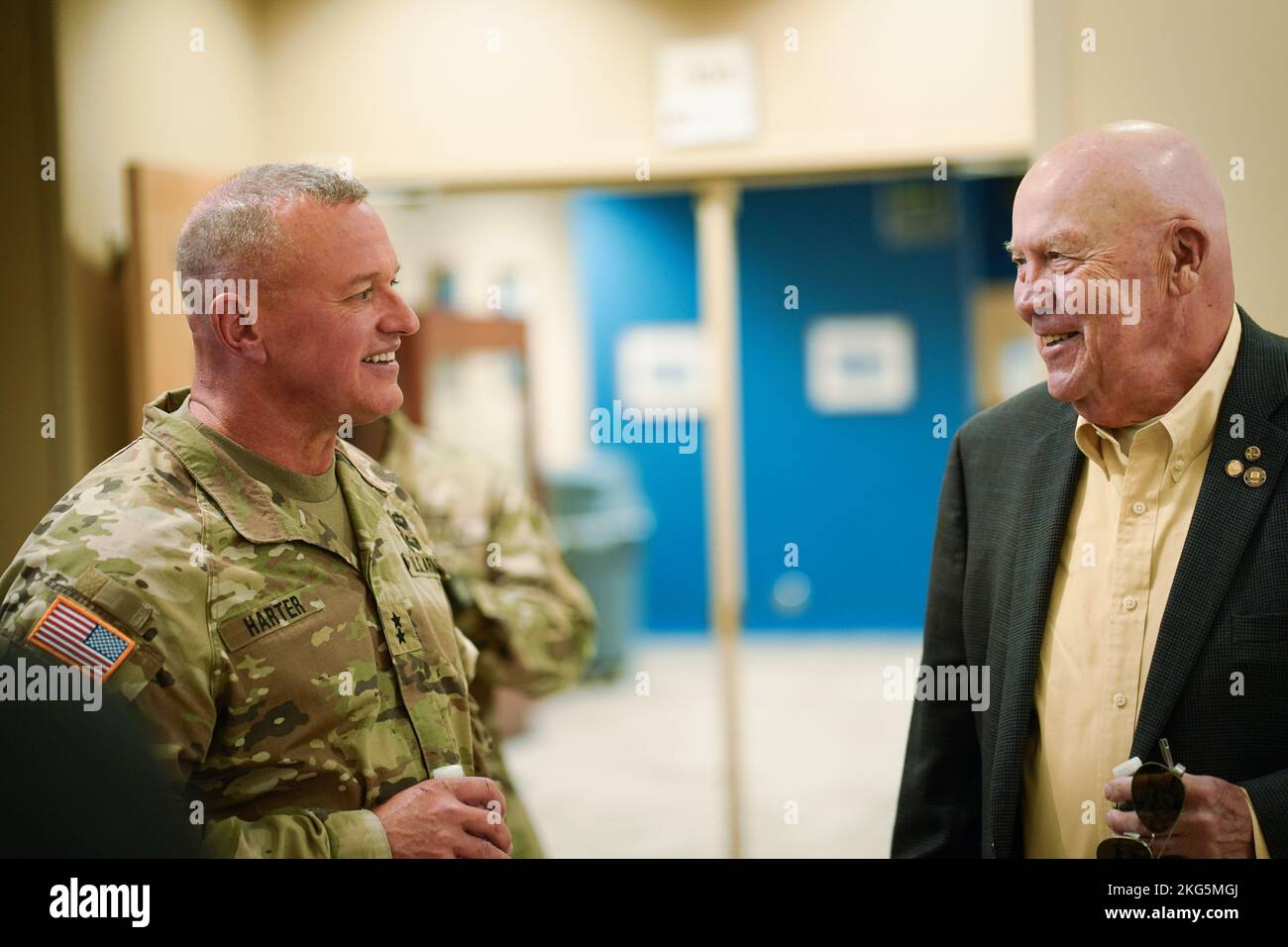 Maj. Gen. Bob D. Harter and Mr. Sam Brick share a laugh after the ...