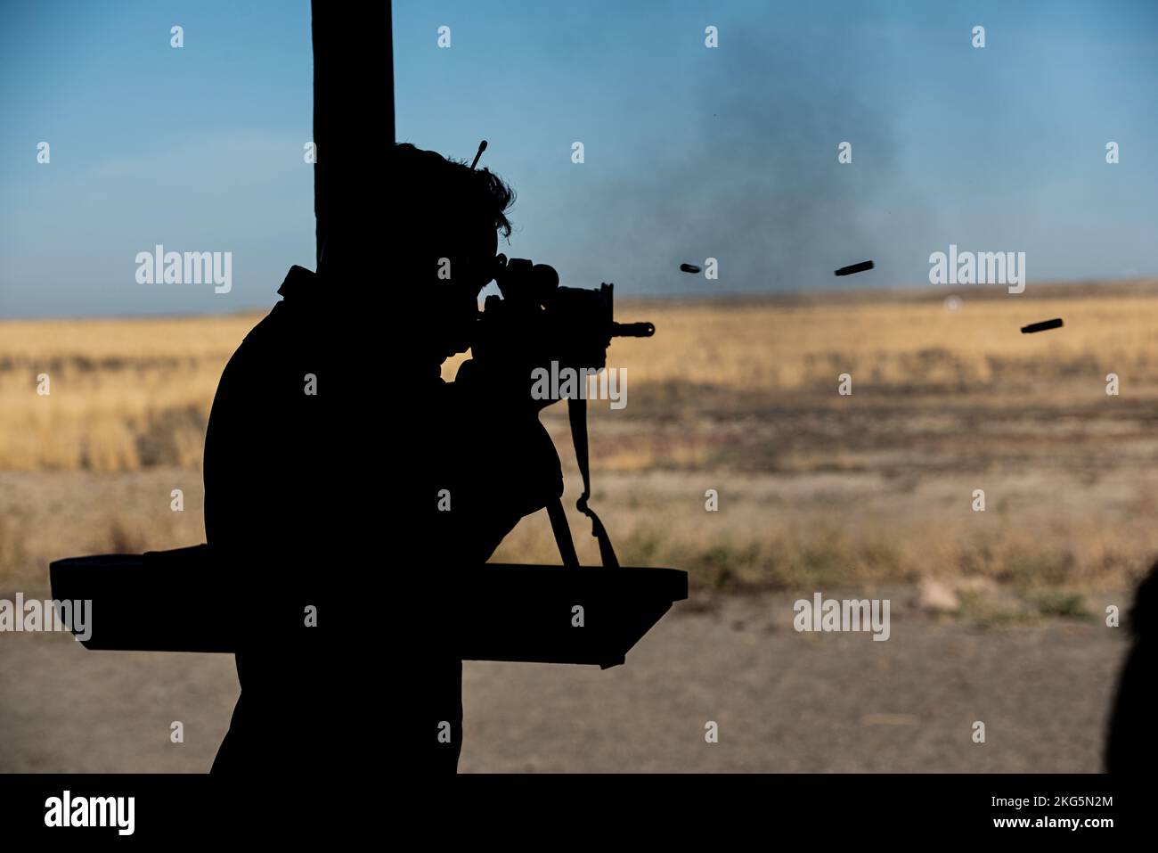 Col. Isaac T. Bell, 366th Fighter Wing Deputy commander, fires a M4 ...