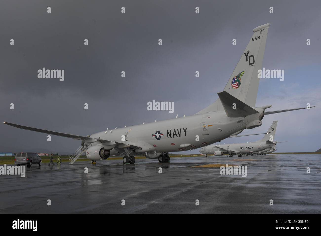 U.S. Navy P-8A Poseidon aircraft are parked on the flightline at Lajes ...