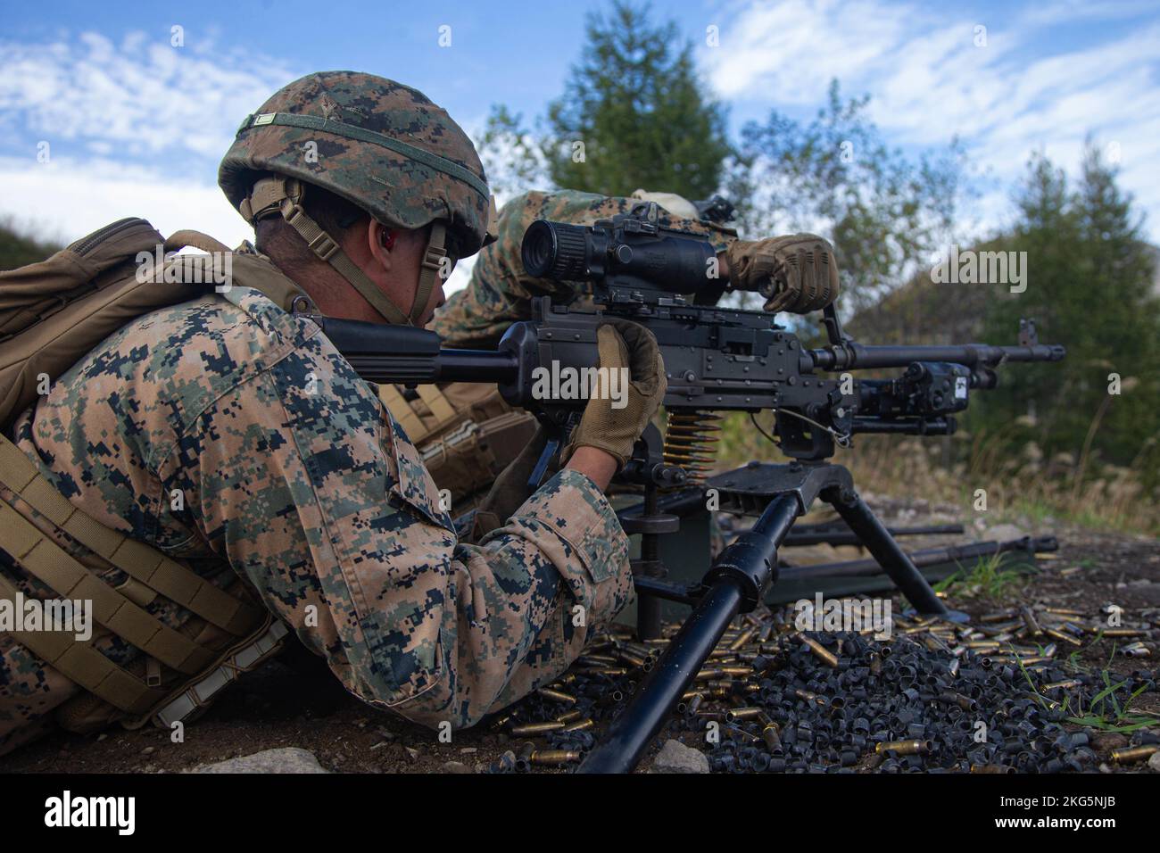 U.S. Marines with 3d Battalion, 3d Marines, 3d Marine Division participate in an M240B machine ...
