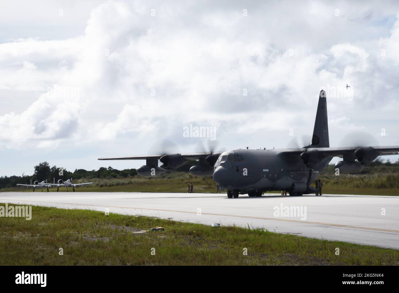 An HC-130J Combat King II team prepares to refuel two A-10C Thunderbolt ...