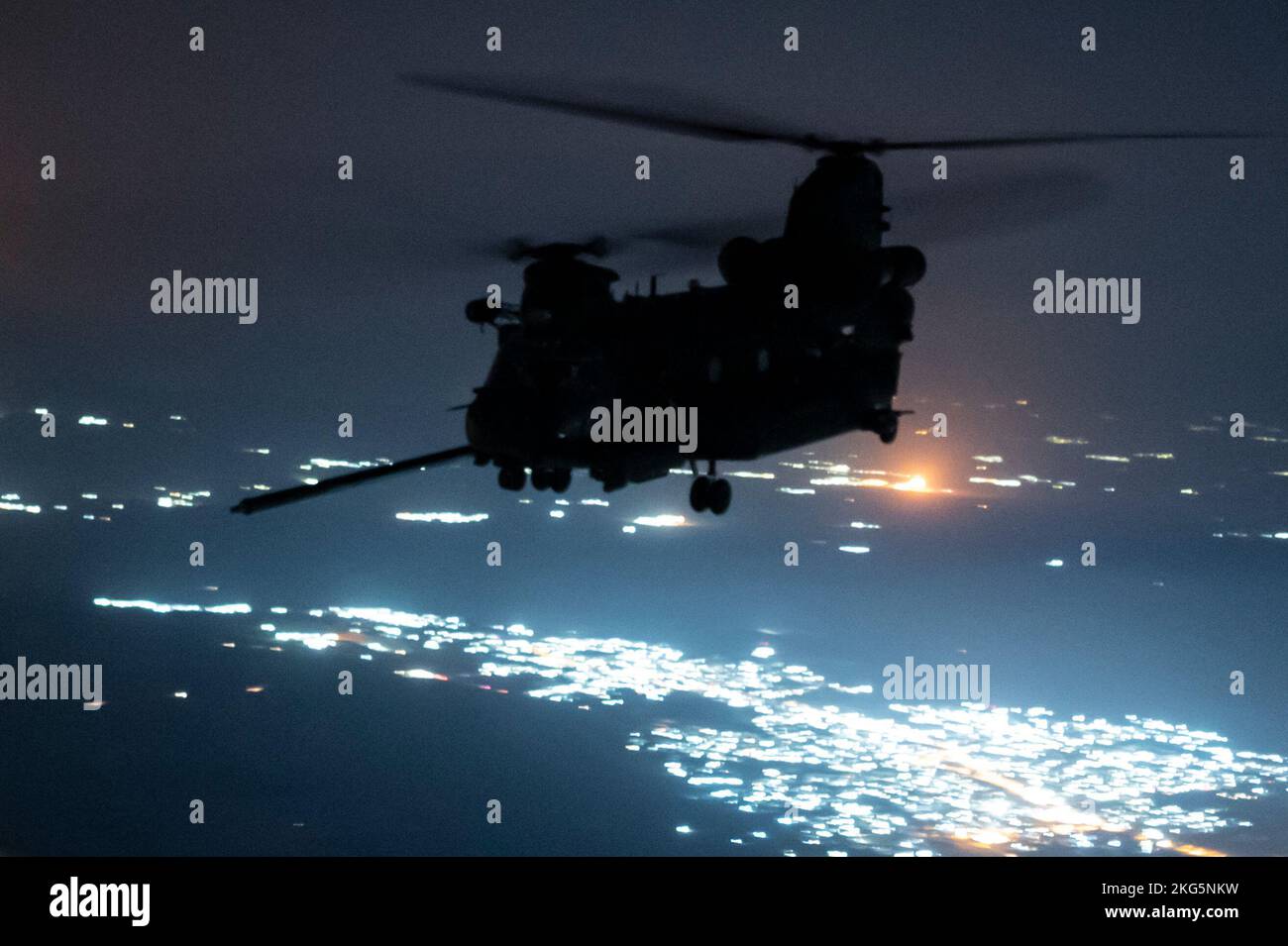 U.S. Army CH-47 Chinook aircrew fly a mission in support of Operation ...