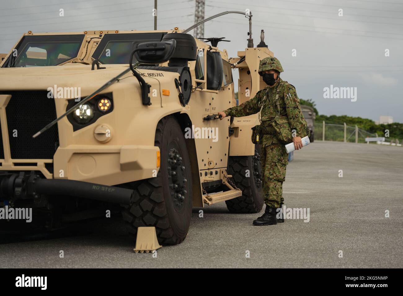 Japan Ground Self Defense Force service members board a U.S. Marine ...