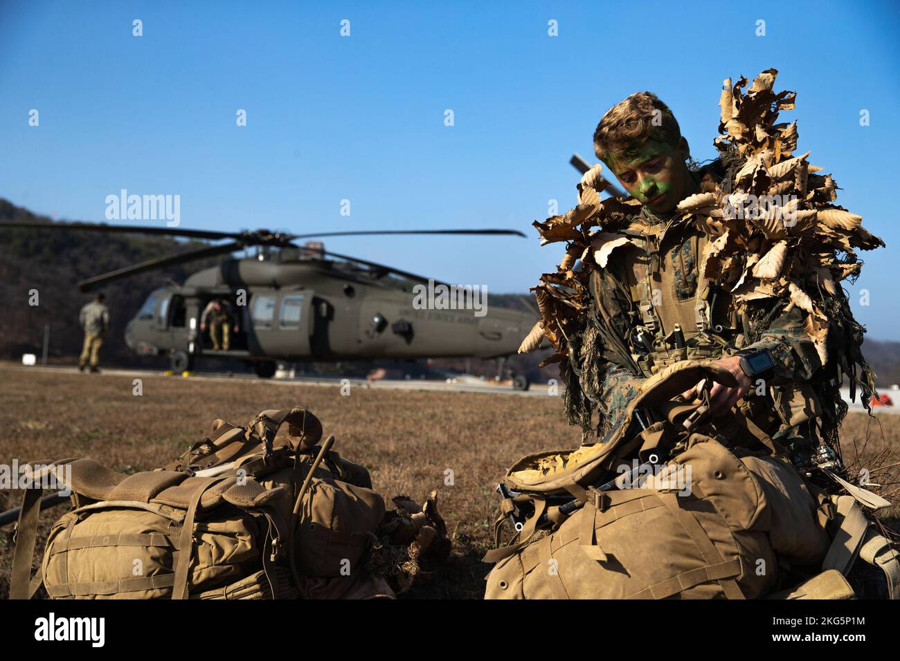 U.S. Marine Corps Lance Cpl. Reed Mederos, a scout sniper with 3d ...
