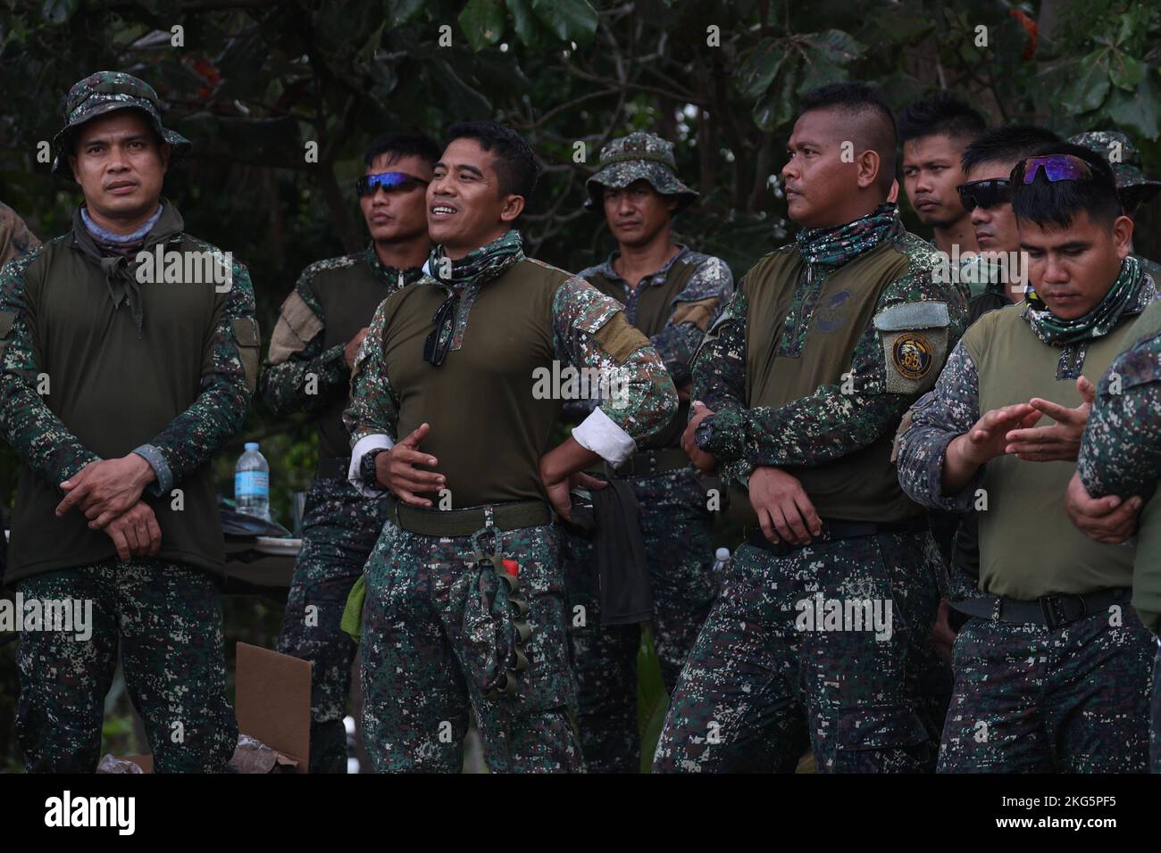 Philippine Marine Corps scout snipers and force reconnaissance Marines prepare a traditional ...