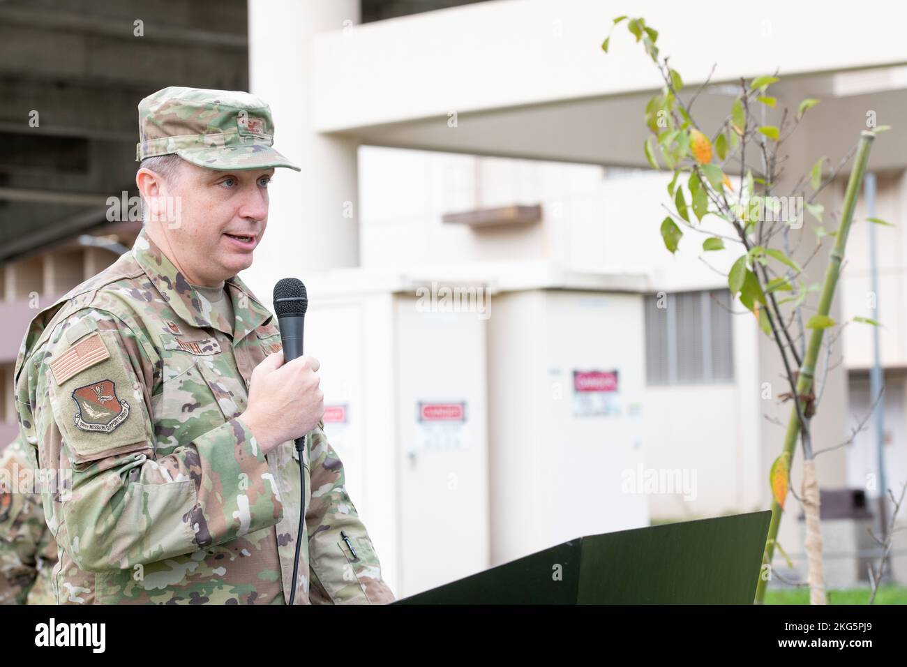 Col. Ryan Vetter, 374th Mission Support Group commander, gives remarks ...