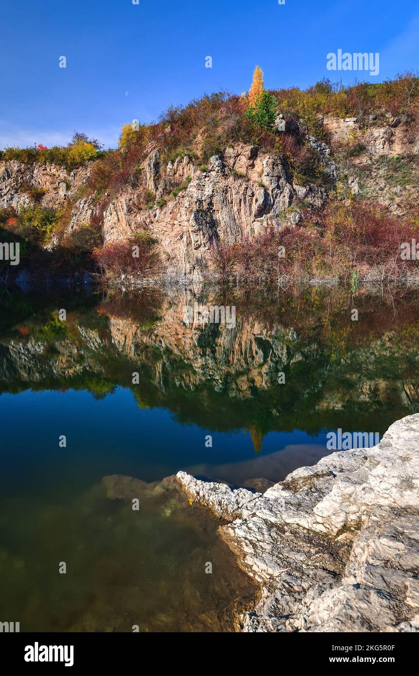 Natural conceptual autumn idea. Quarry landscape with leaves in fall ...