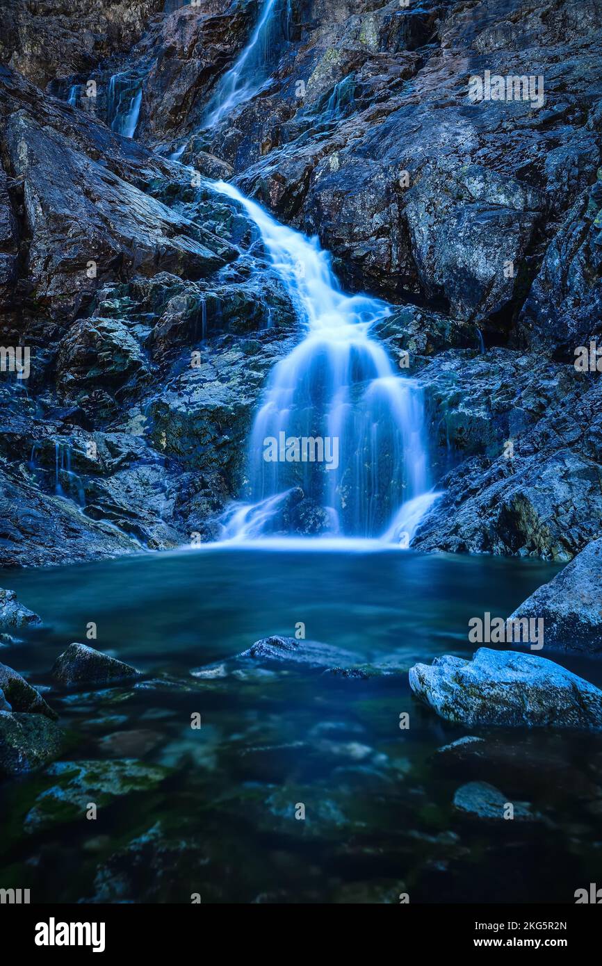 Beautiful waterfall with blurred water effect. Photo taken in the ...
