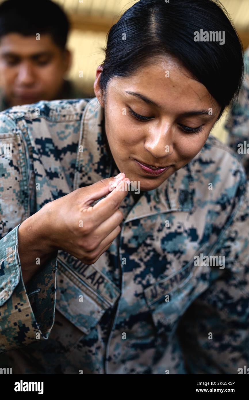 U.S. Marine Corps Cpl. Madelaluz Aguilar, a food service specialist ...