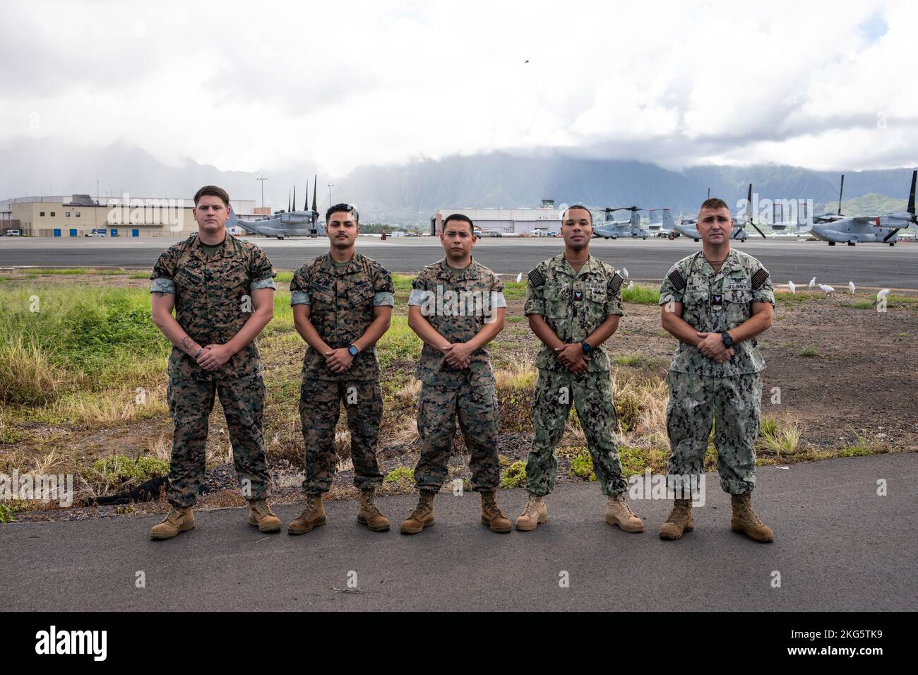 U.S. Marine Corps Sgt. Ethan Slongwhite, left, structural mechanic ...