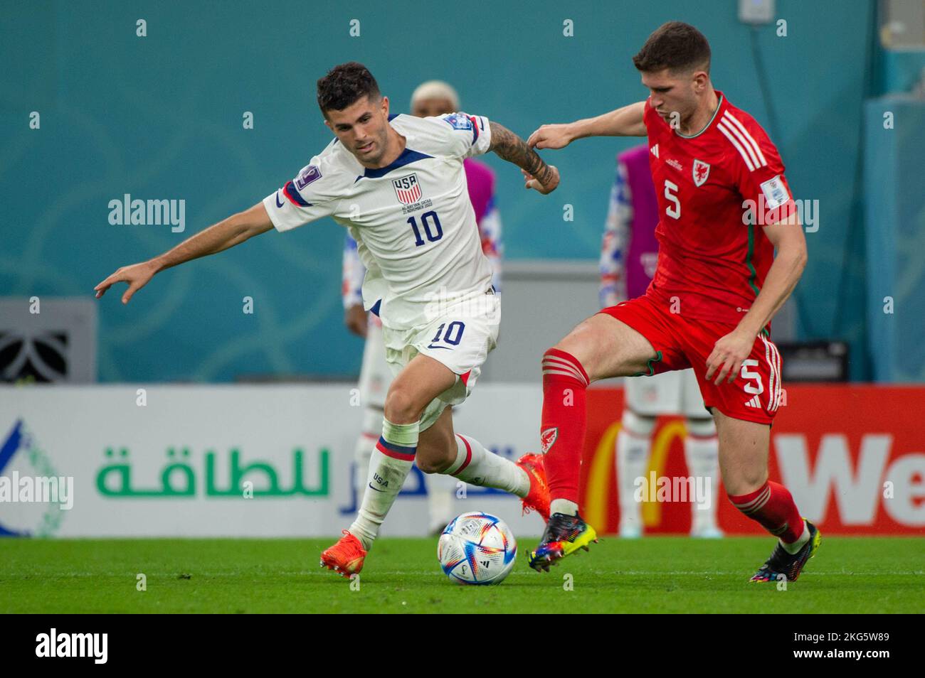 Christian PULISIC of USA and Chris MEPHAM of Wales during the FIFA ...