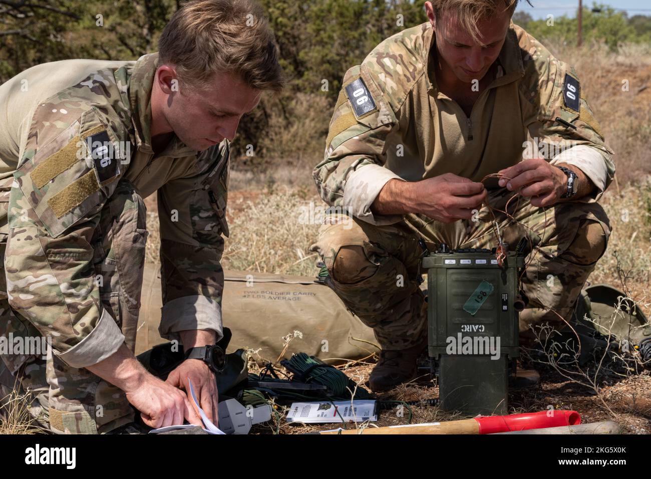 U.S. Air Force 1st Lt. Eric Sanderson, left, 13th Air Support ...
