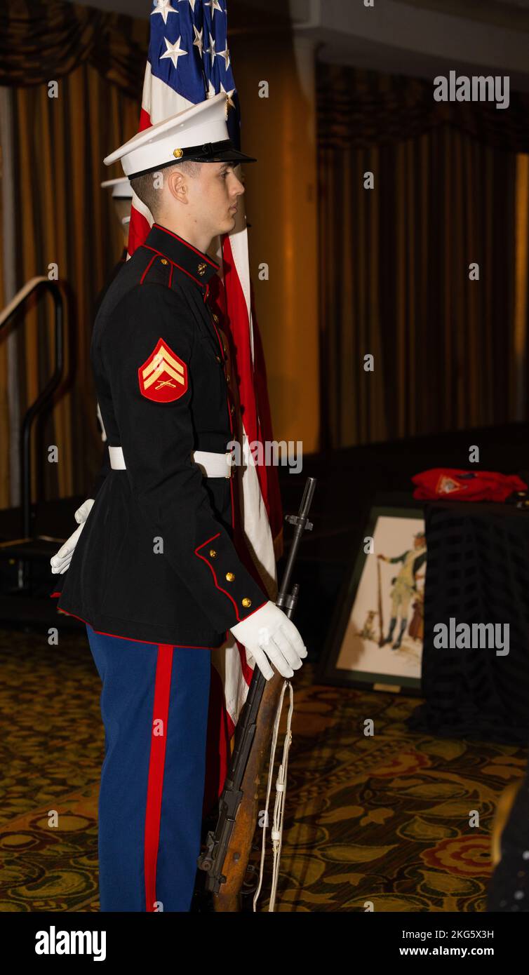 U.S. Marines with the Marine Corps Base Quantico color guard stand ...