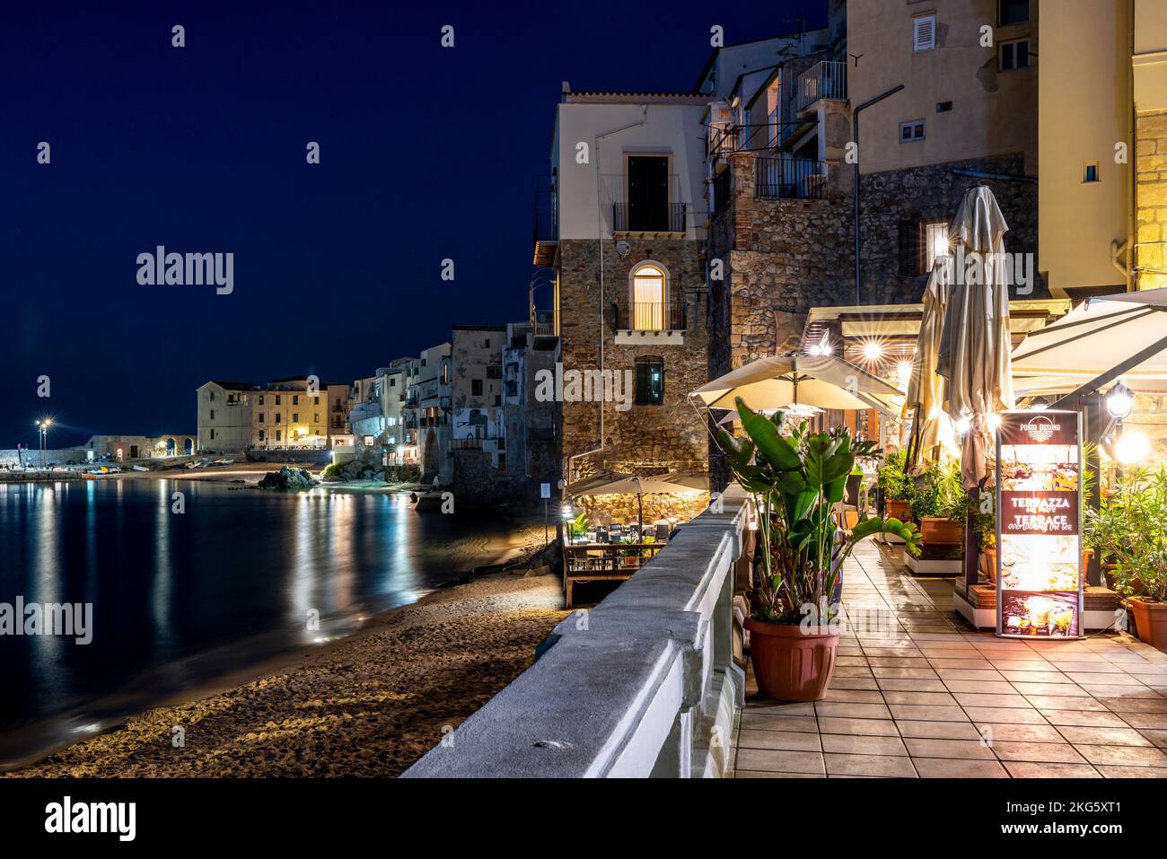 A Seafront Restaurant At Night, Cefalu, Sicily, Italy Stock Photo - Alamy