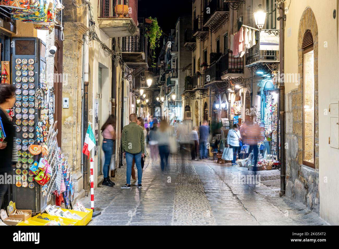 A Colourful Street At Night In The Resort Town of Cefalu, Sicily, Italy ...