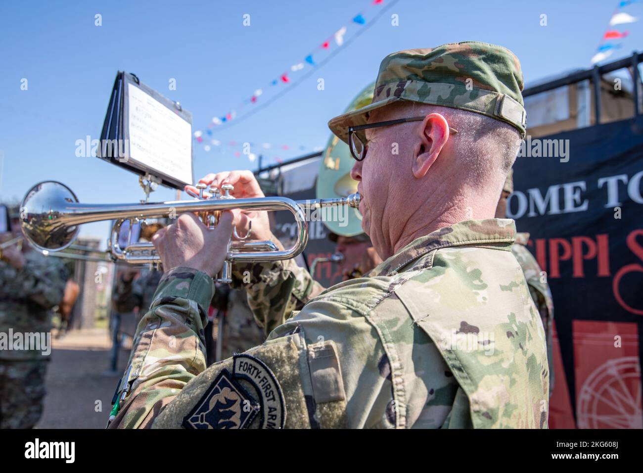 Sgt. 1st Class Lee, a trumpet player with the 41st Army Band ...