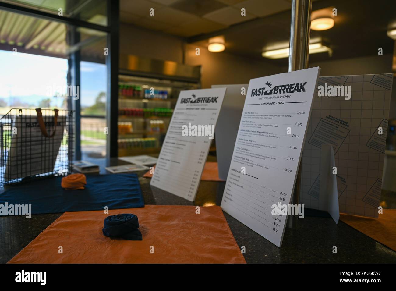 Menus sit on display at Fast Brrreak at Davis-Monthan Air Force Base ...