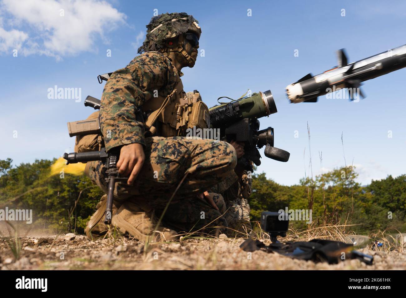 U.S. Marine Corps Lance Cpl. Amer Alamer (front) and Cpl. Chance Brown ...
