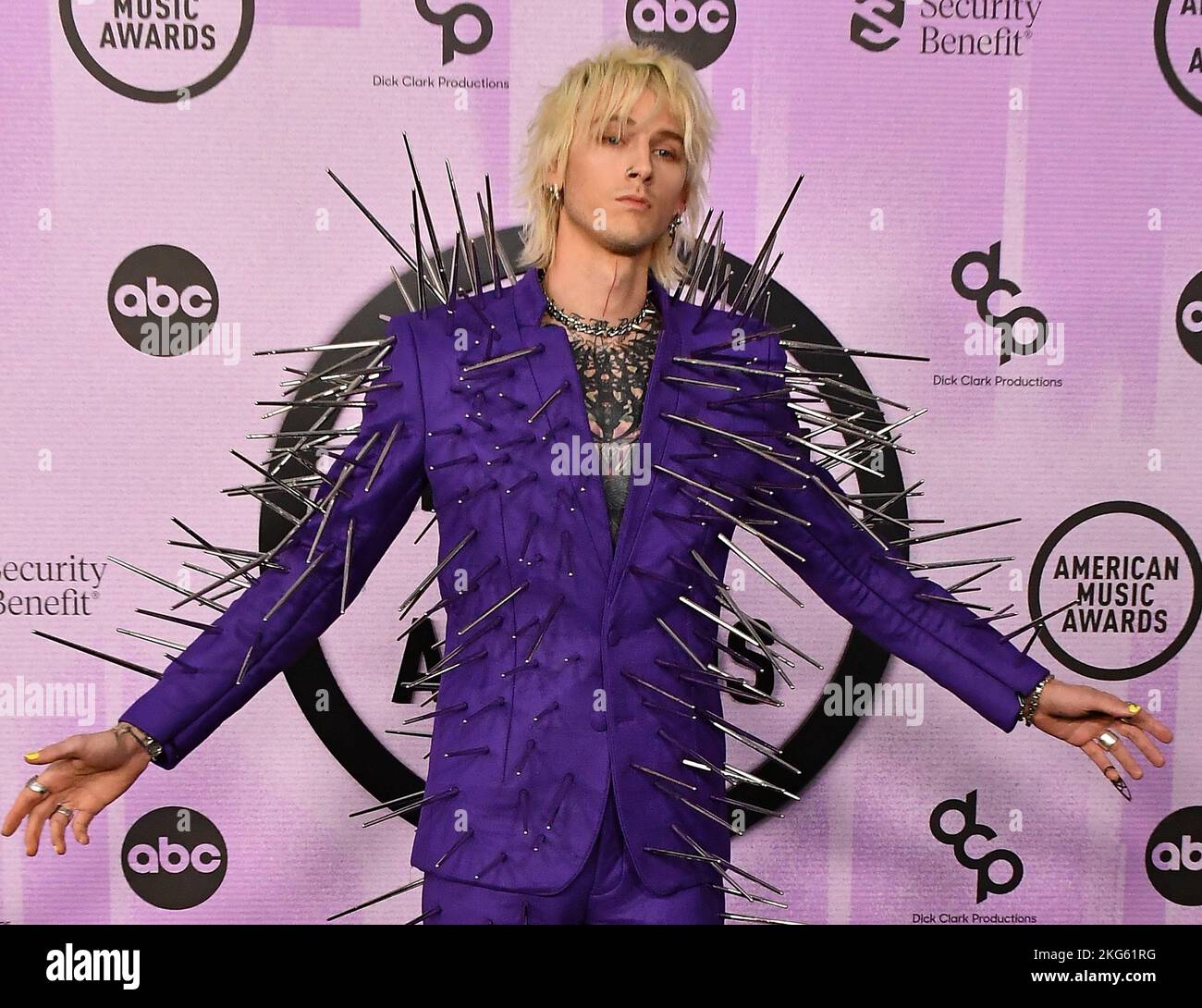 Machine Gun Kelly attends the 2022 American Music Awards at Microsoft ...