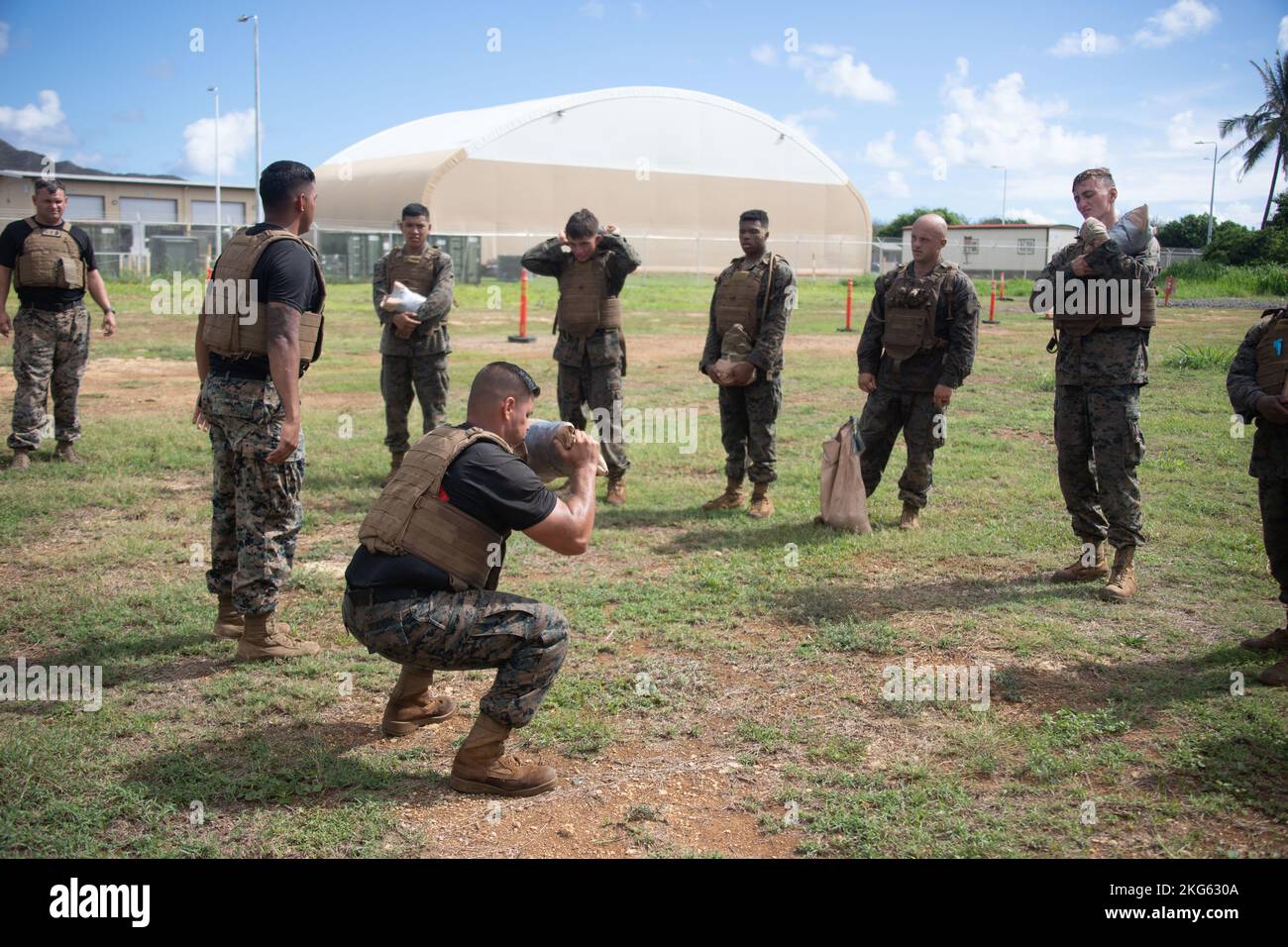 U.S. Marine Corps Martial Arts Instructors demonstrate an exercise ...