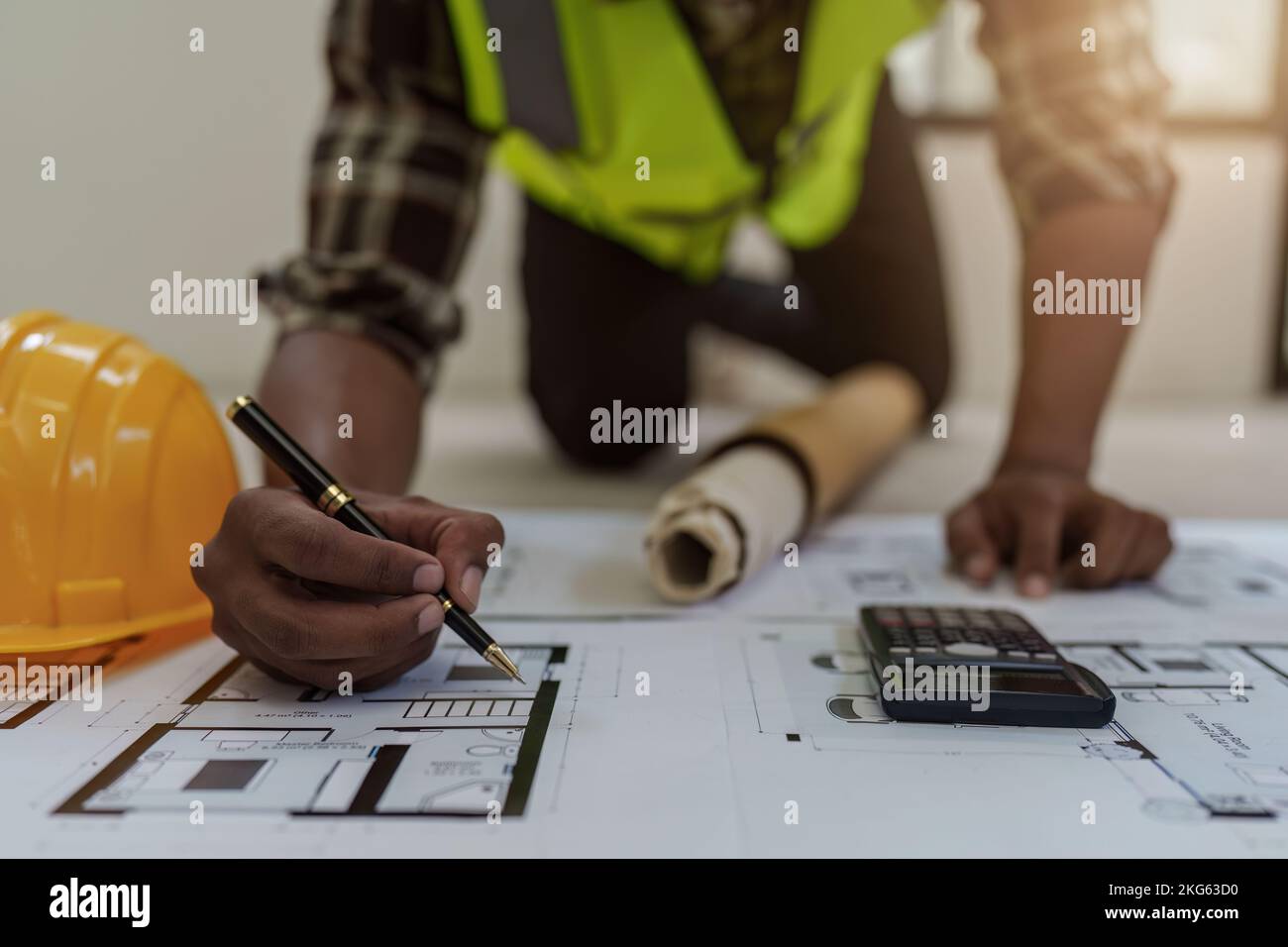 Professional architect designer structural engineer team colleagues discussing building plan ...