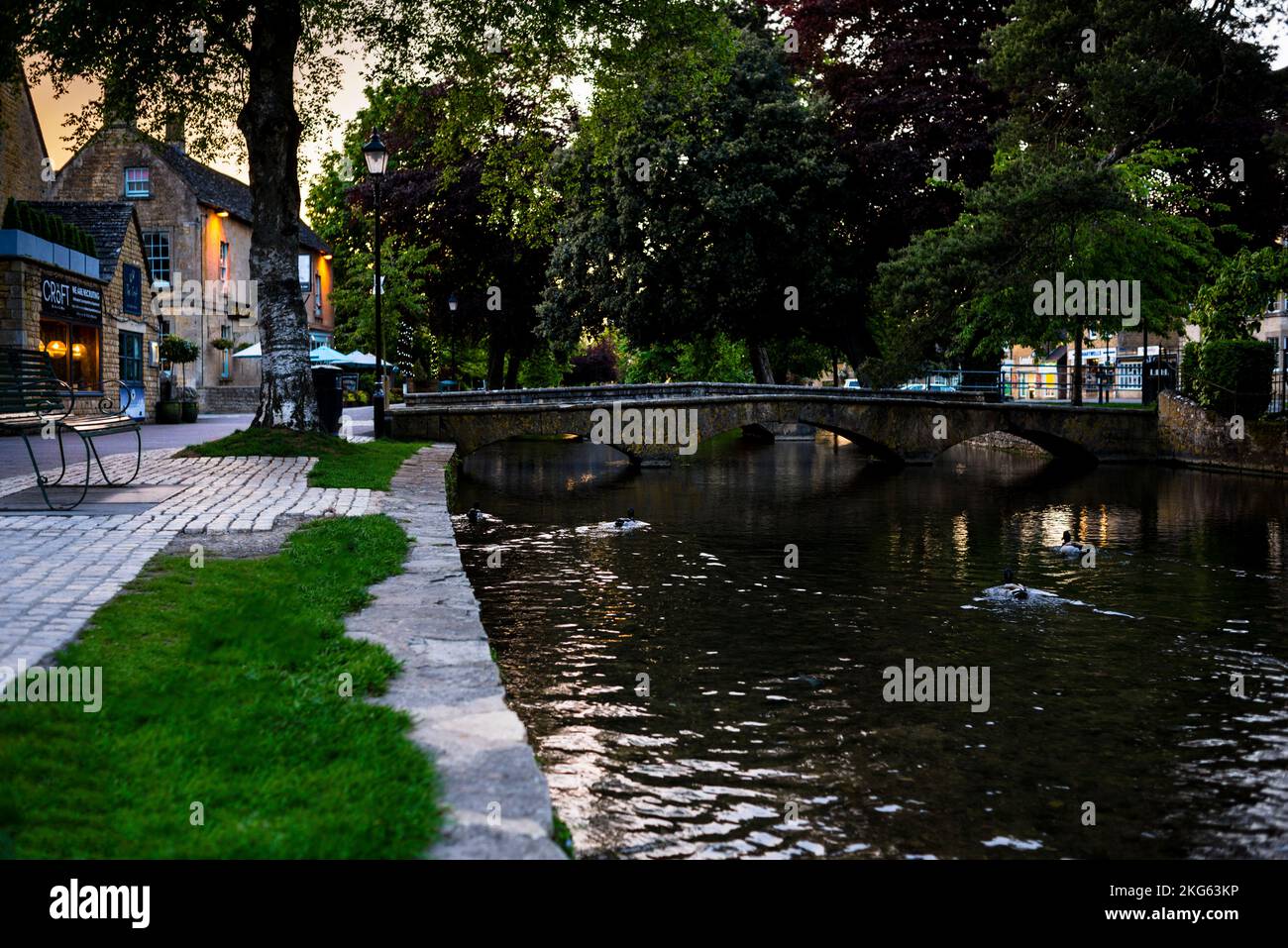 Arched stone footbridges over the River Windrush in Bourton-on-the ...