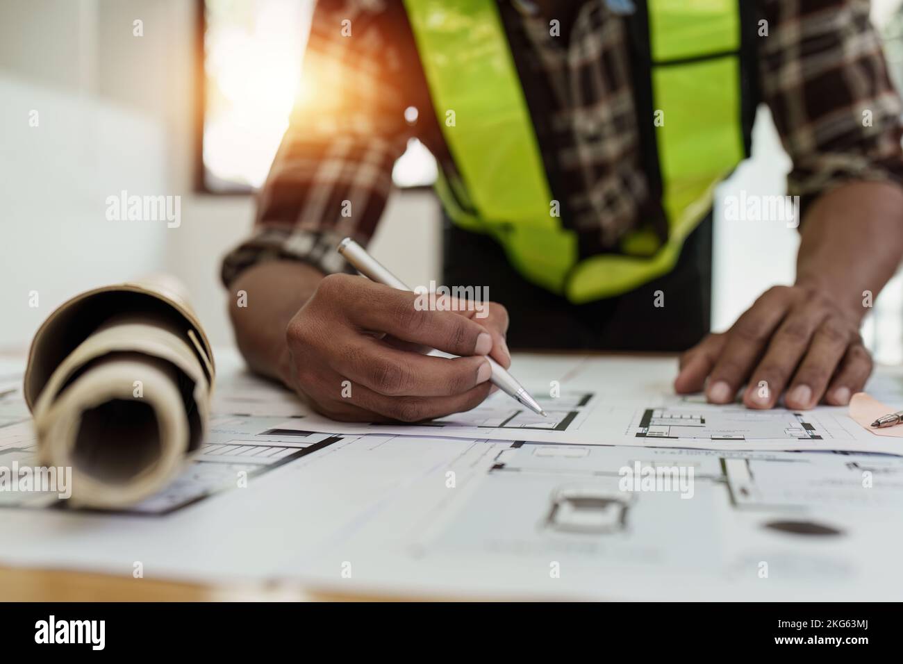 Professional architect designer structural engineer working with blueprint design project Stock ...