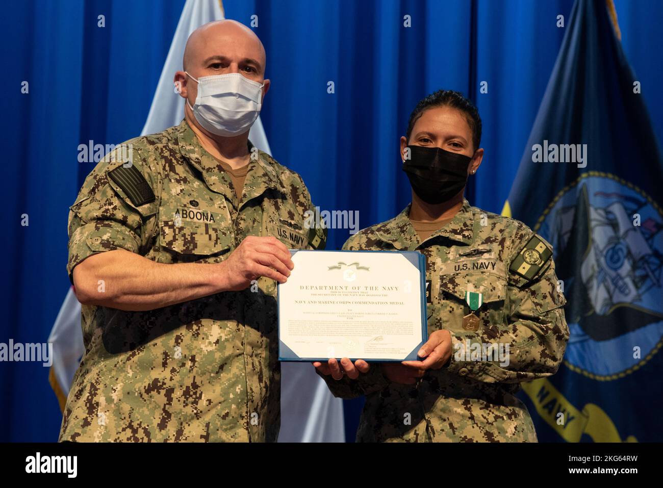 Hospital Corpsman 1st Class Corrine Ramos receives her Navy and Marine ...
