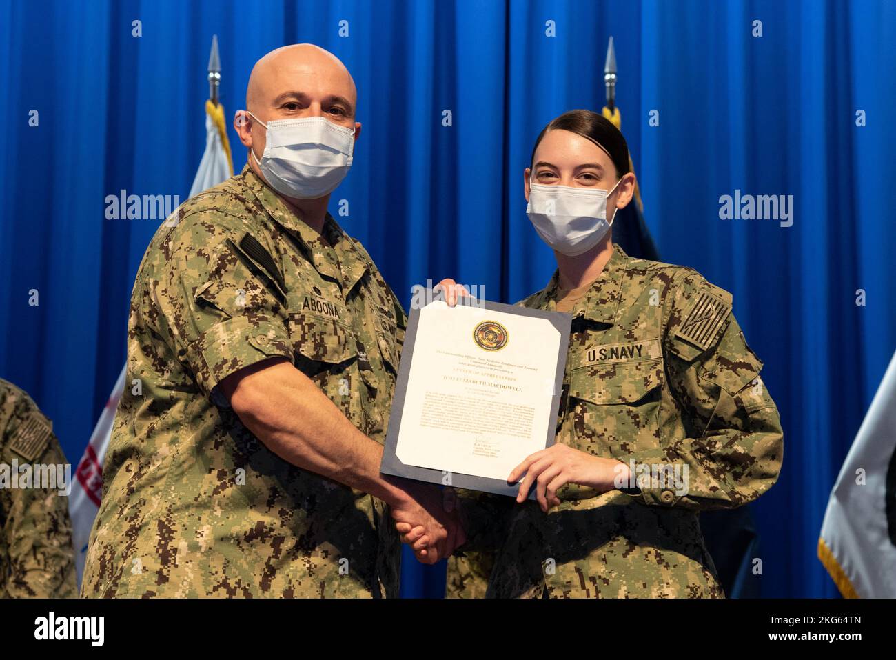 Hospital Corpsman 2nd Class Elizabeth Macdowell receives a Letter of ...