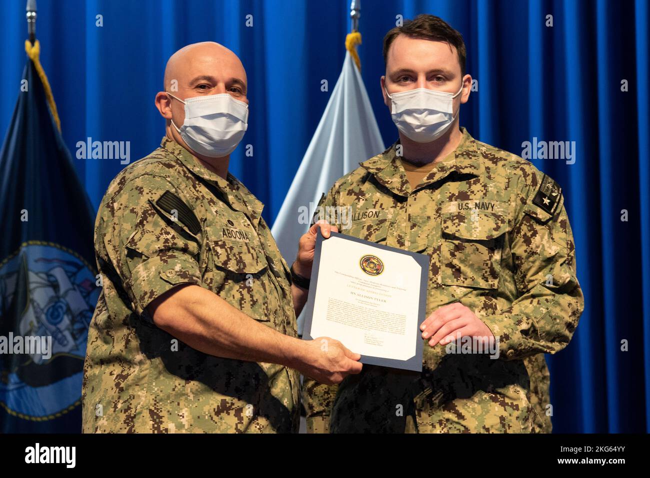 Hospital Corpsman Tyler Allison receives a Letter of Appreciation from ...