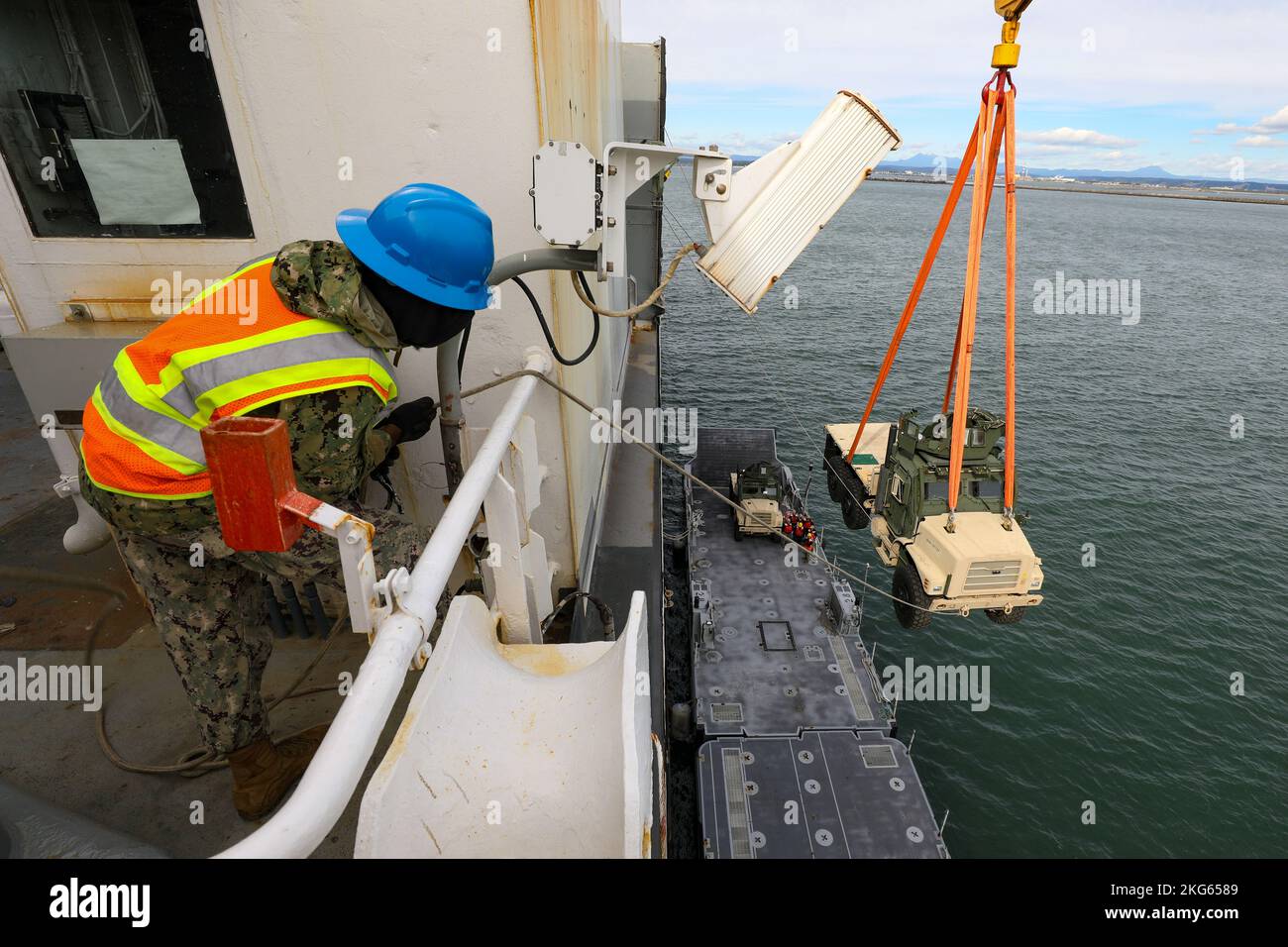 A U.S. Navy Sailor with Guam detachment, Naval Expeditionary Logistics ...