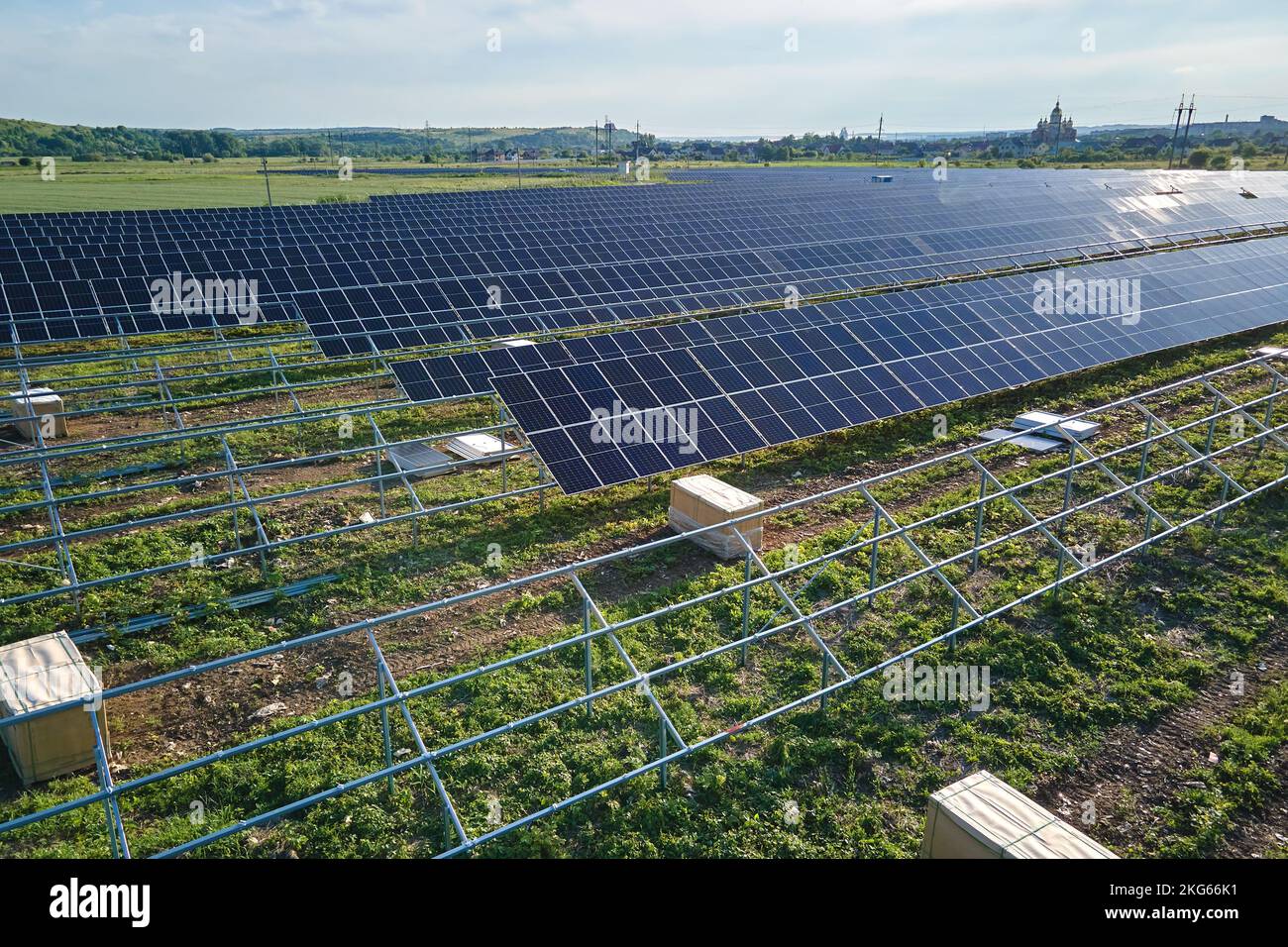 Aerial view of big electric power plant under construction with many ...