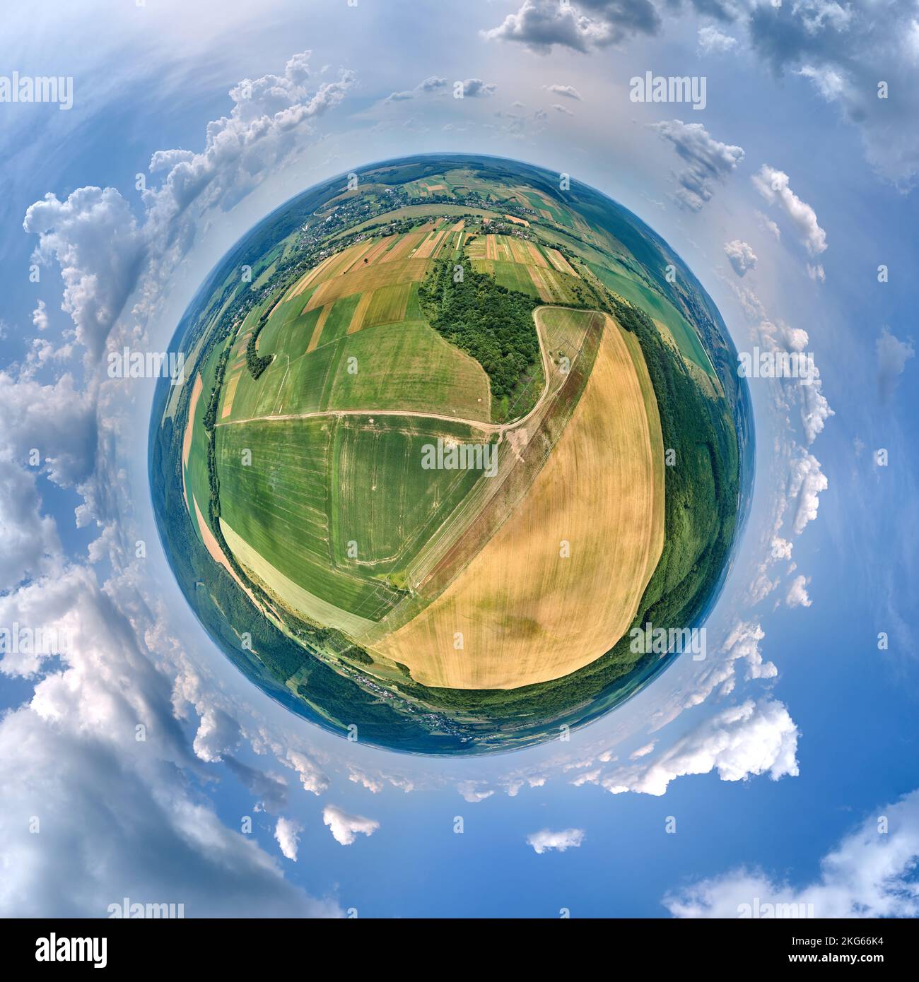 Aerial view from high altitude of little planet earth with green and ...