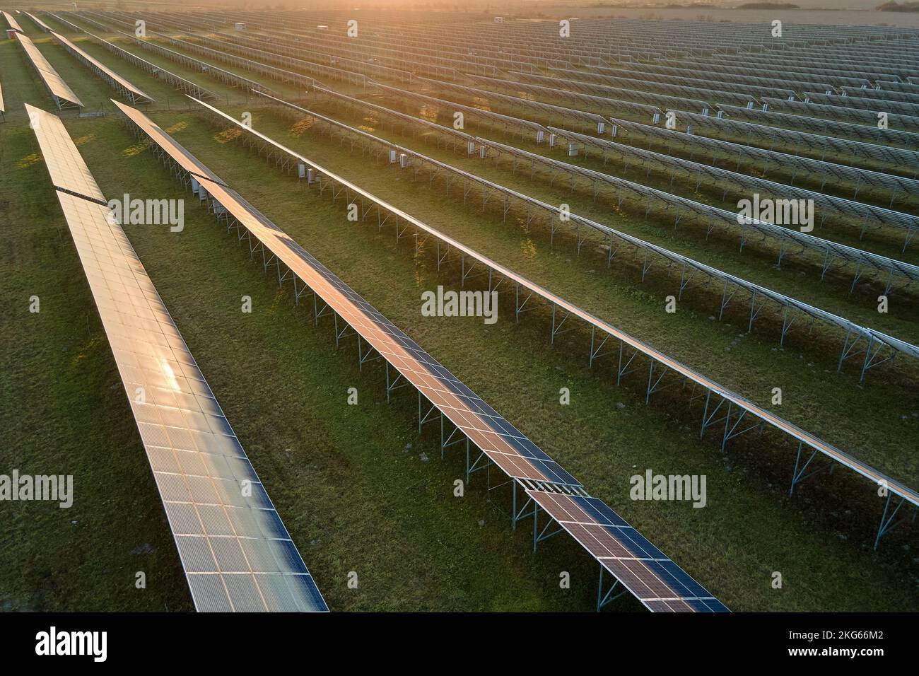 Aerial view of big sustainable electric power plant with many rows of ...