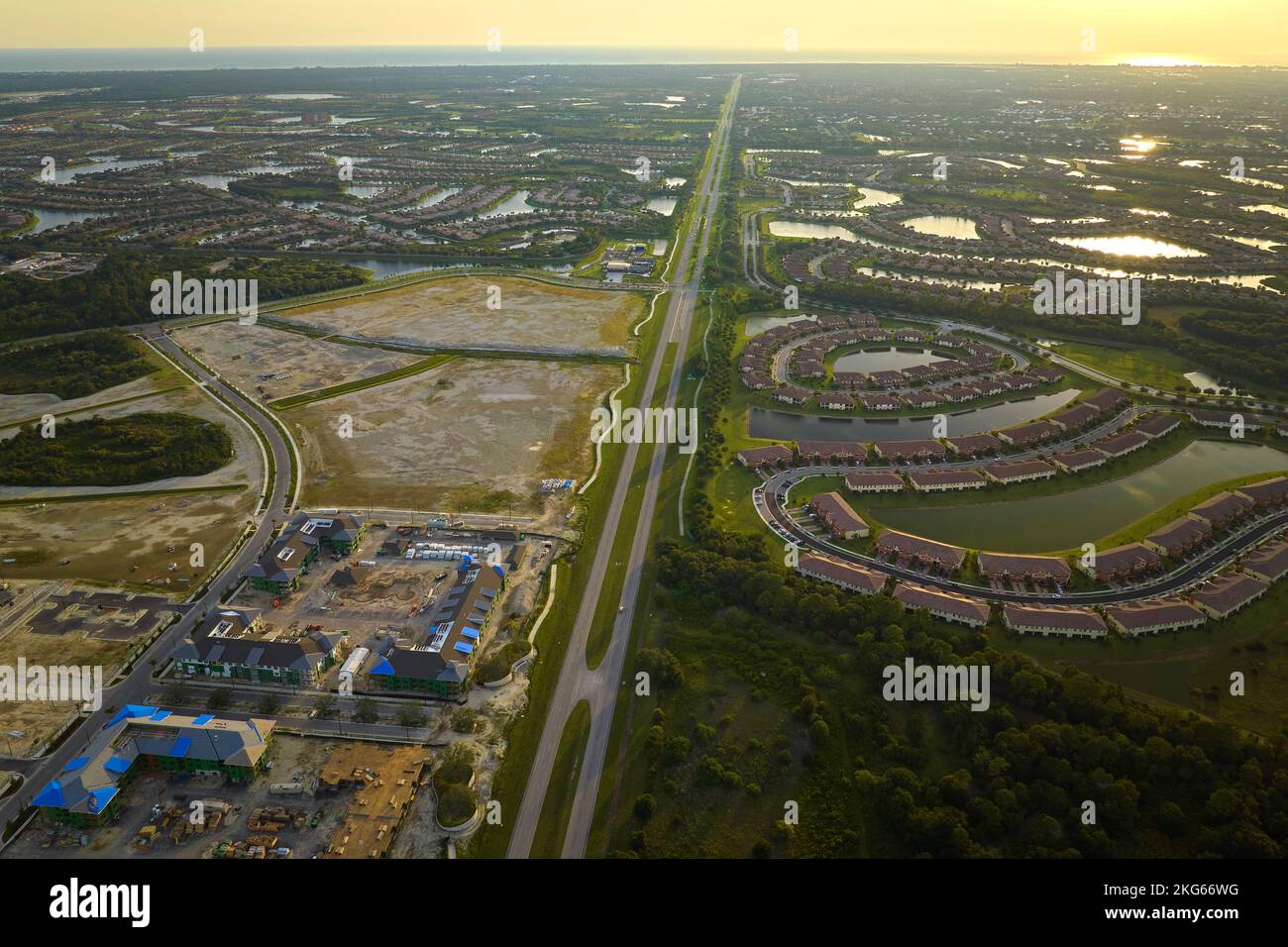 Aerial view of construction site with new tightly packed homes in ...