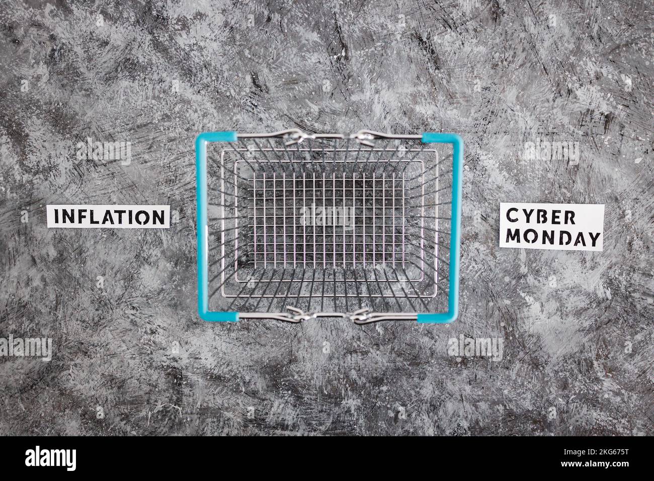 Inflation vs Cyber Monday conceptual image with empty shopping basket ...