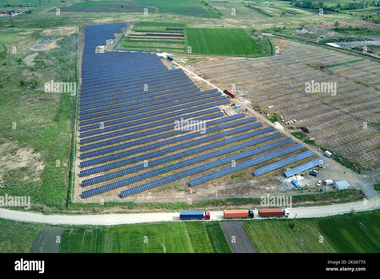 Aerial view of electrical power plant under construction with truck ...