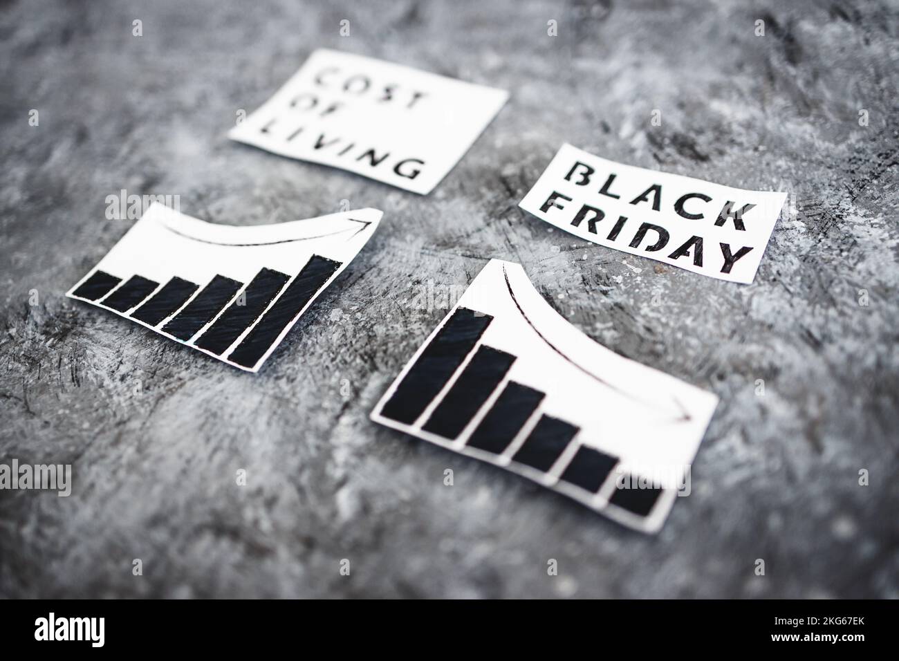 Cost of Living vs Black Friday conceptual image with graphs showing ...