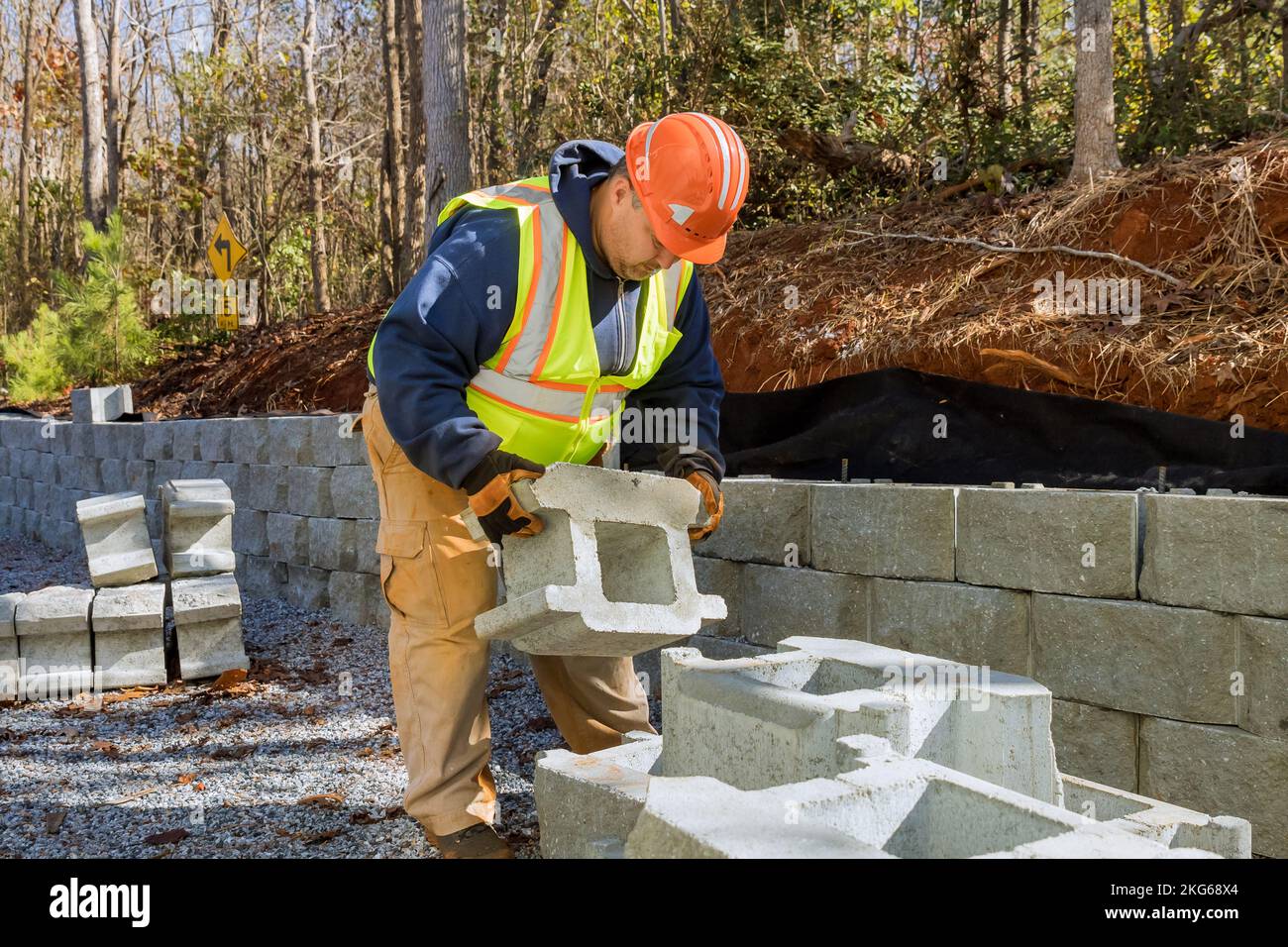 An contractor was installing concrete block walls on part new retaining ...
