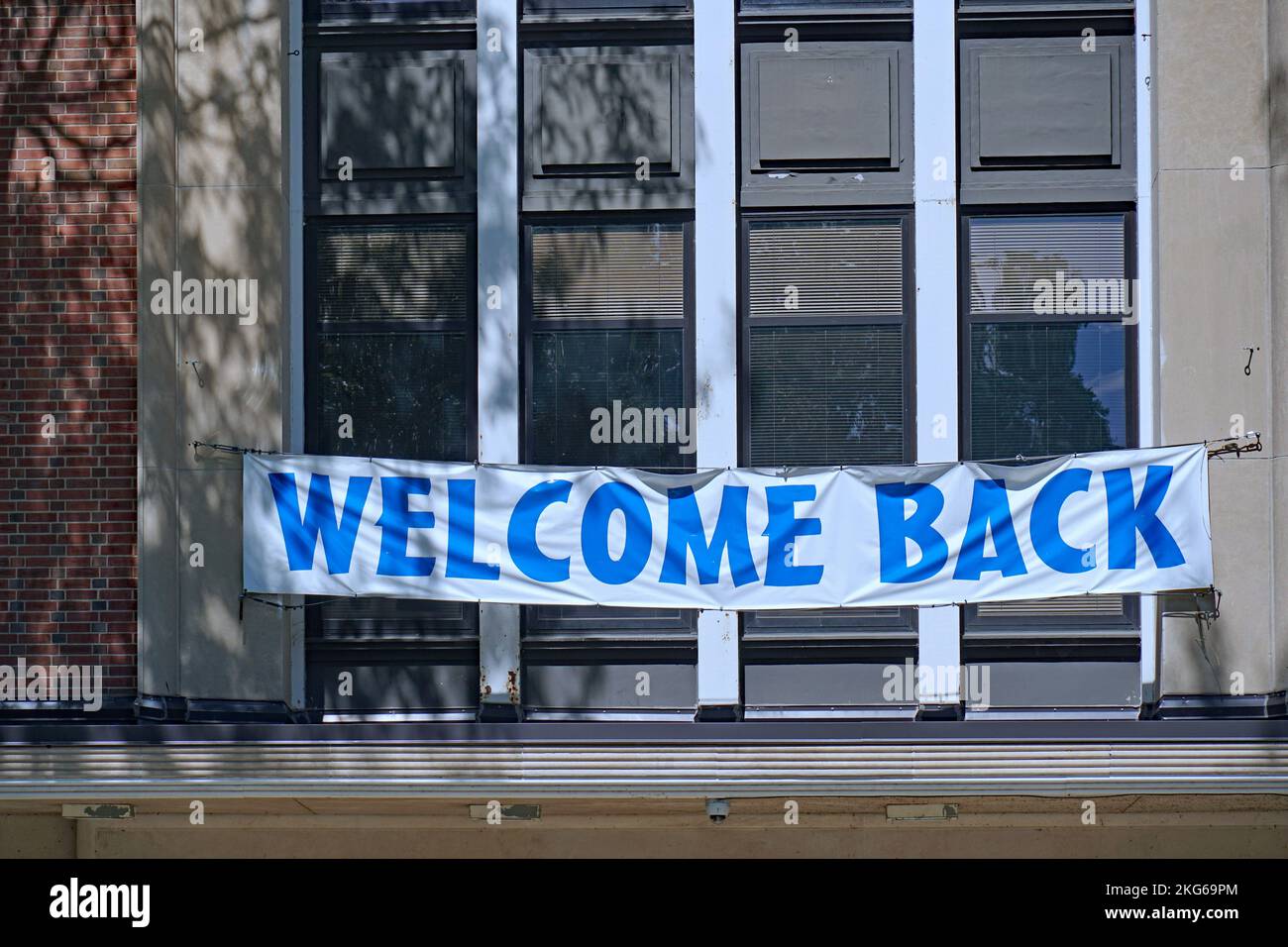 Sign on high school building welcoming students back in September Stock ...