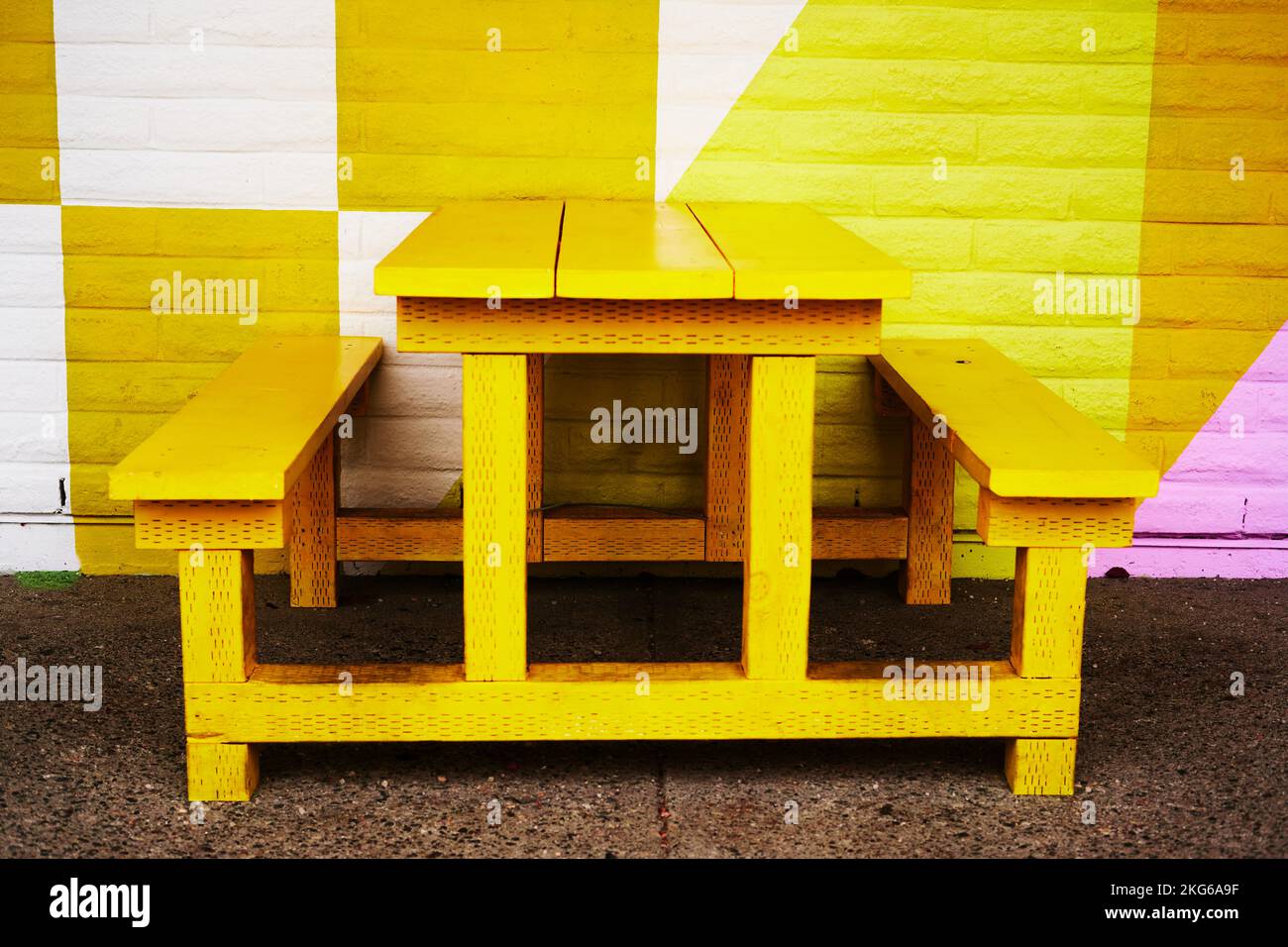 Beautiful background of yellow bench Stock Photo - Alamy