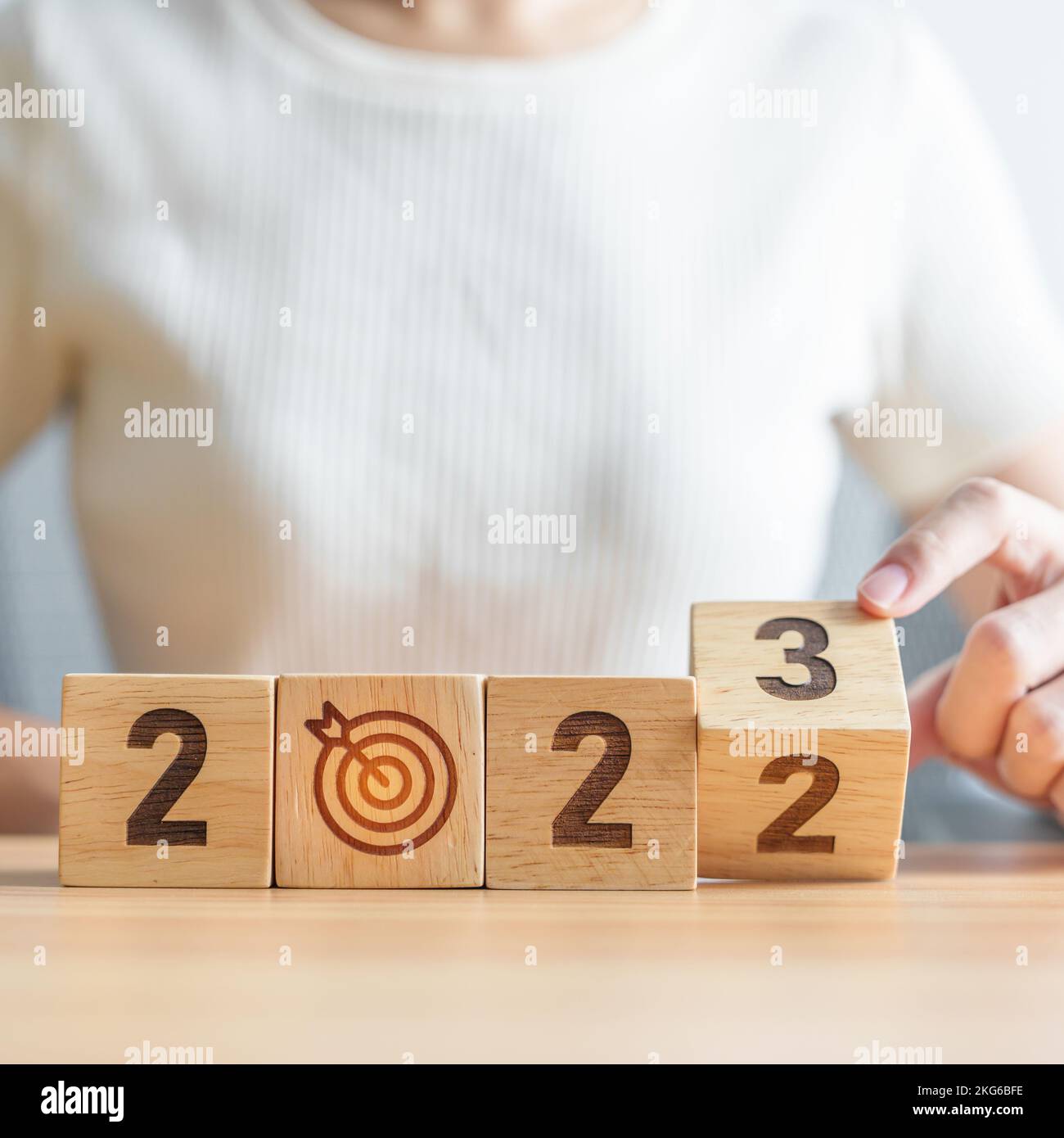 woman hand change 2022 to 2023 block with dartboard icon. Goal, Target, Resolution, strategy ...