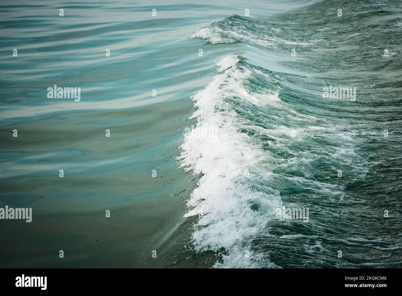 An aerial view of sea waves breaking beach Stock Photo - Alamy