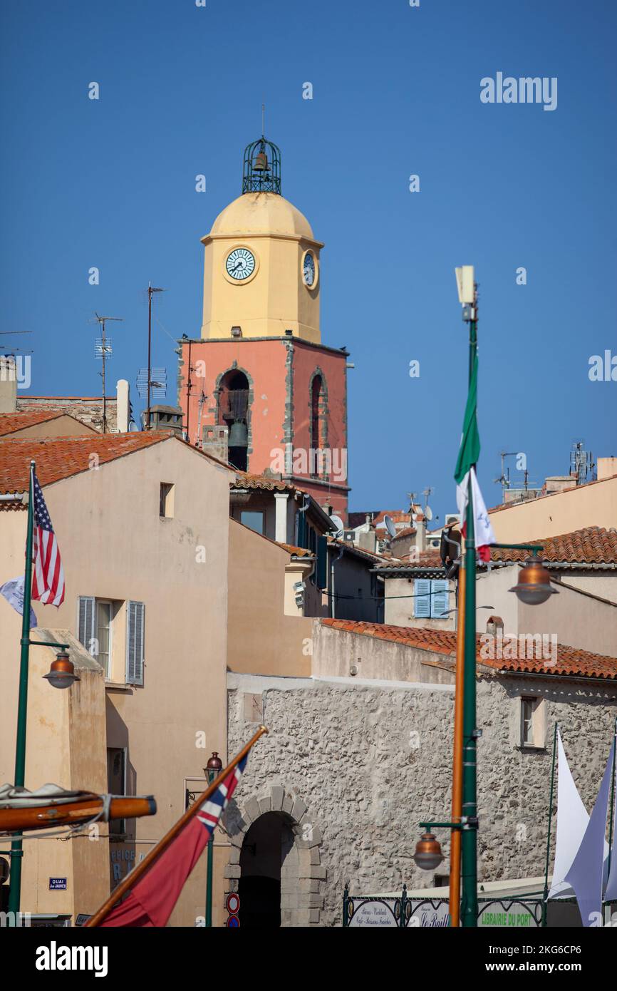 Saint-Tropez church bell tower ans small white sails Stock Photo - Alamy
