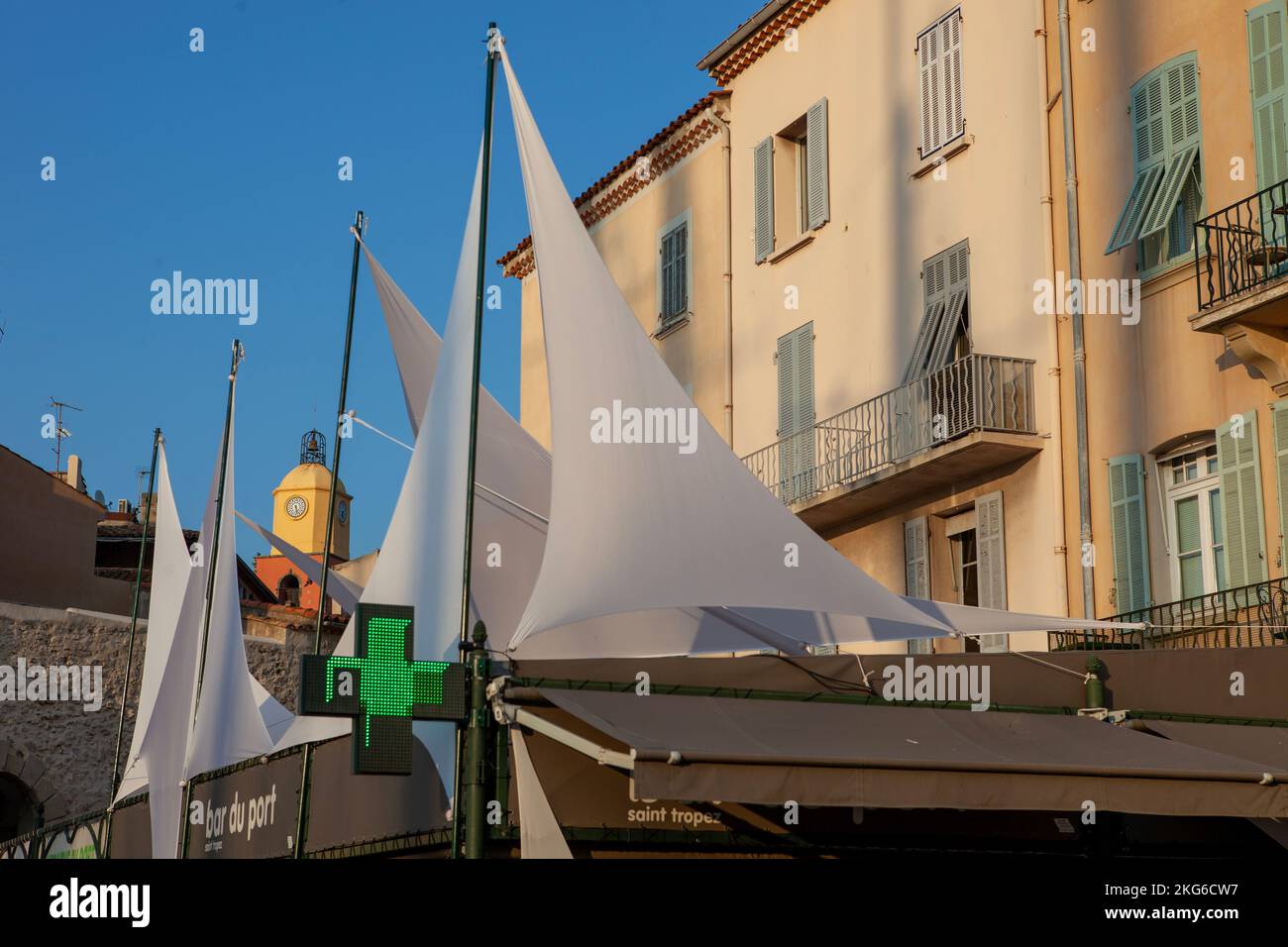 Saint-Tropez church bell tower ans small white sails Stock Photo - Alamy