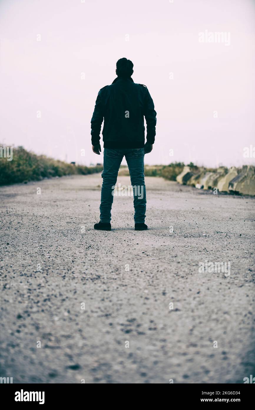Back view of man standing on street hi-res stock photography and images ...