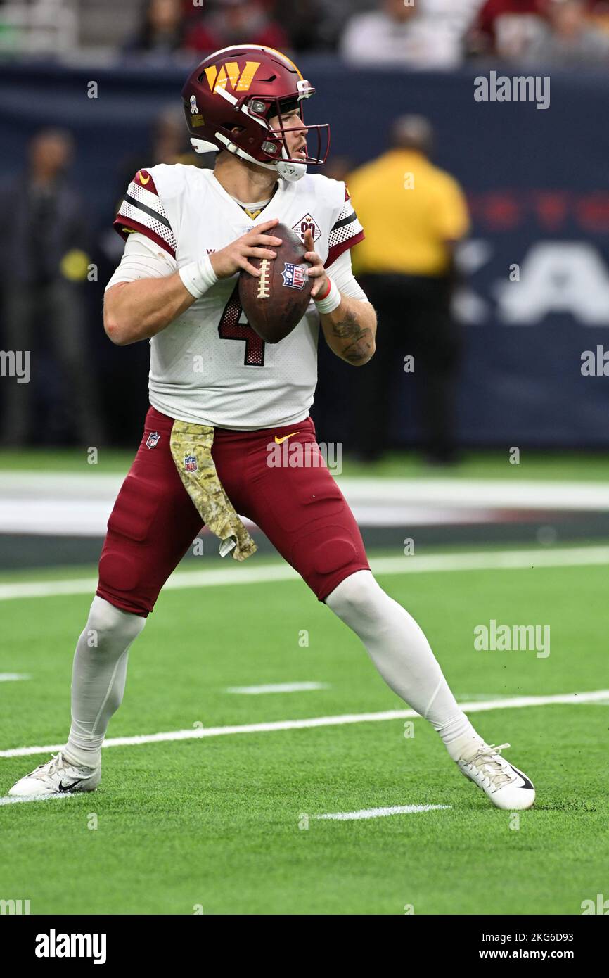 Washington Commanders quarterback Taylor Heinicke (4) drops back top ...