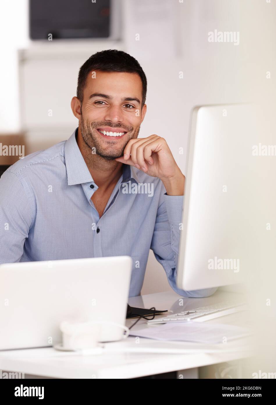 You can trust him to deliver the best results. a smiling young man ...