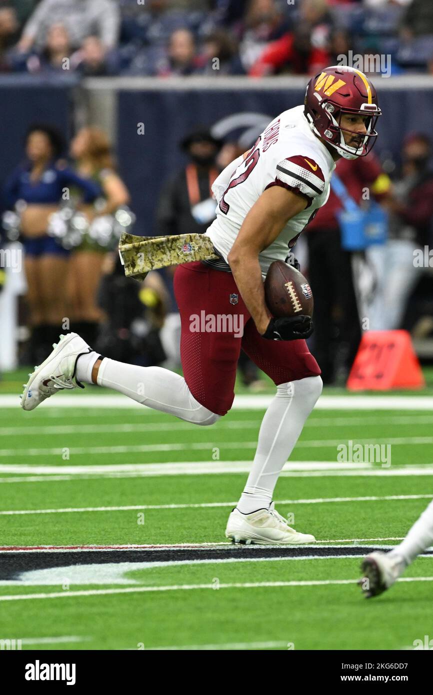 Washington Commanders tight end Logan Thomas (82) runs after catching a ...