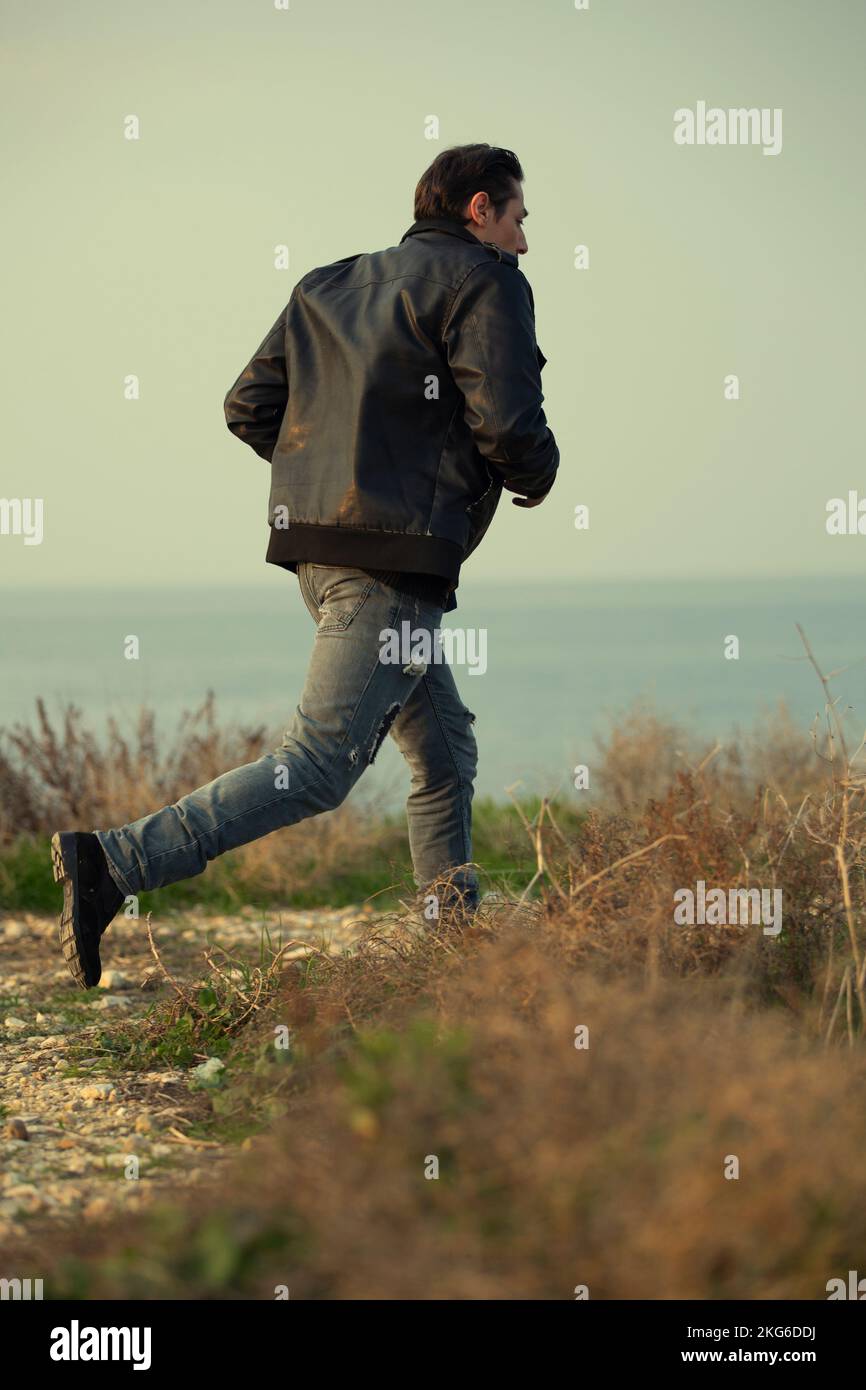 Middle man running behind hi-res stock photography and images - Alamy